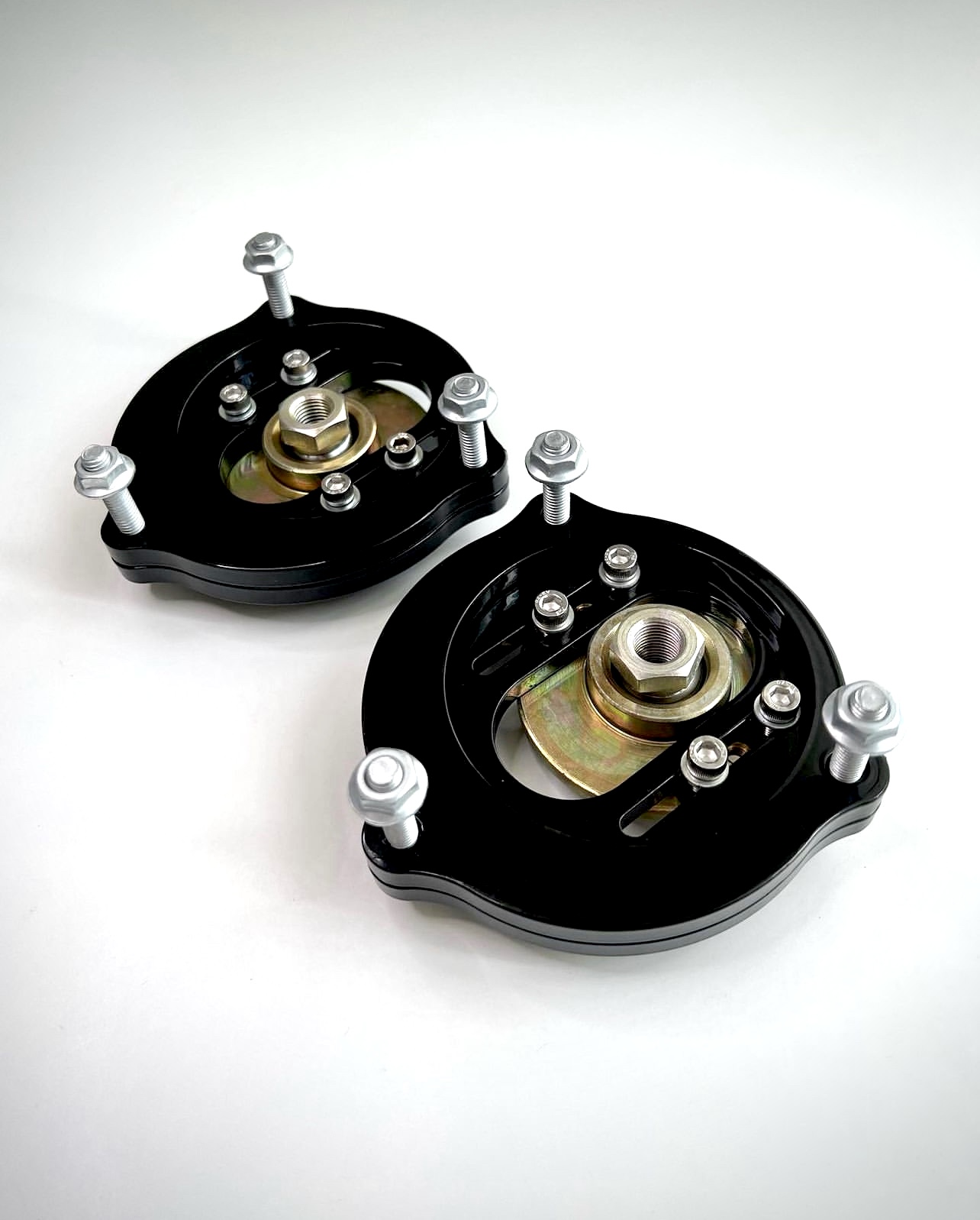 Top camber plates